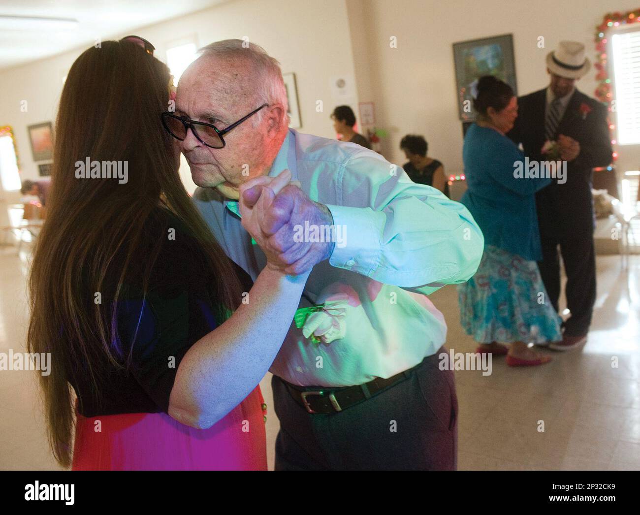 Victor Bowker enjoys dancing with Shani Phillips Friday, April 24, 2015 at the Senior Prom ...