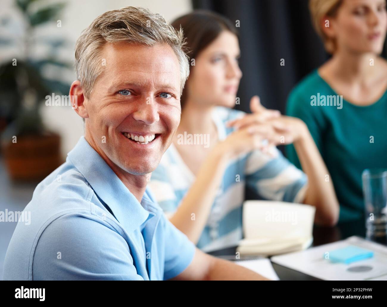 Taking care of business with a smile. Portrait of a mature man in a ...