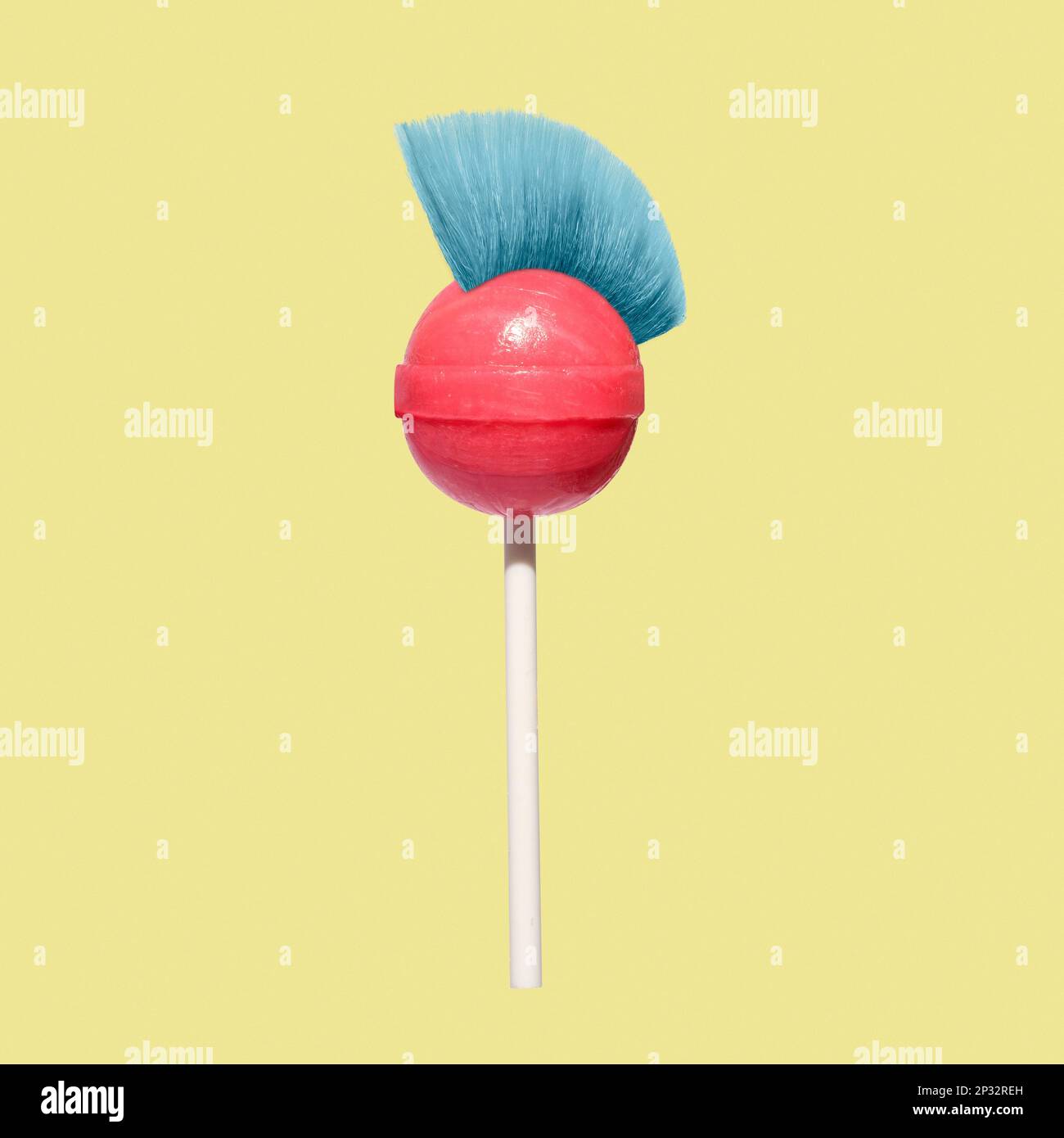 Crazy fun candy on a stick with a mohawk hairstyle. Minimal concept of ...