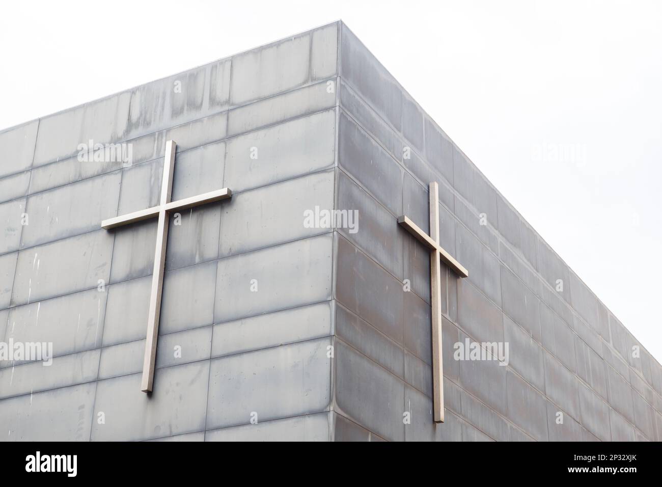 Two Metal Crosses on the Facade of a Modern Church Stock Photo - Alamy