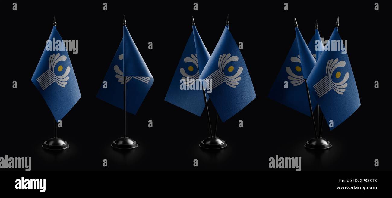 Small national flags of the CIS on a black background Stock Photo - Alamy