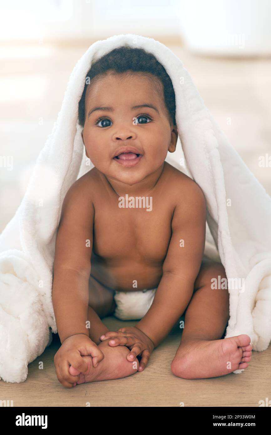 Adorable baby, black child and blanket for play, fun and newborn on ...