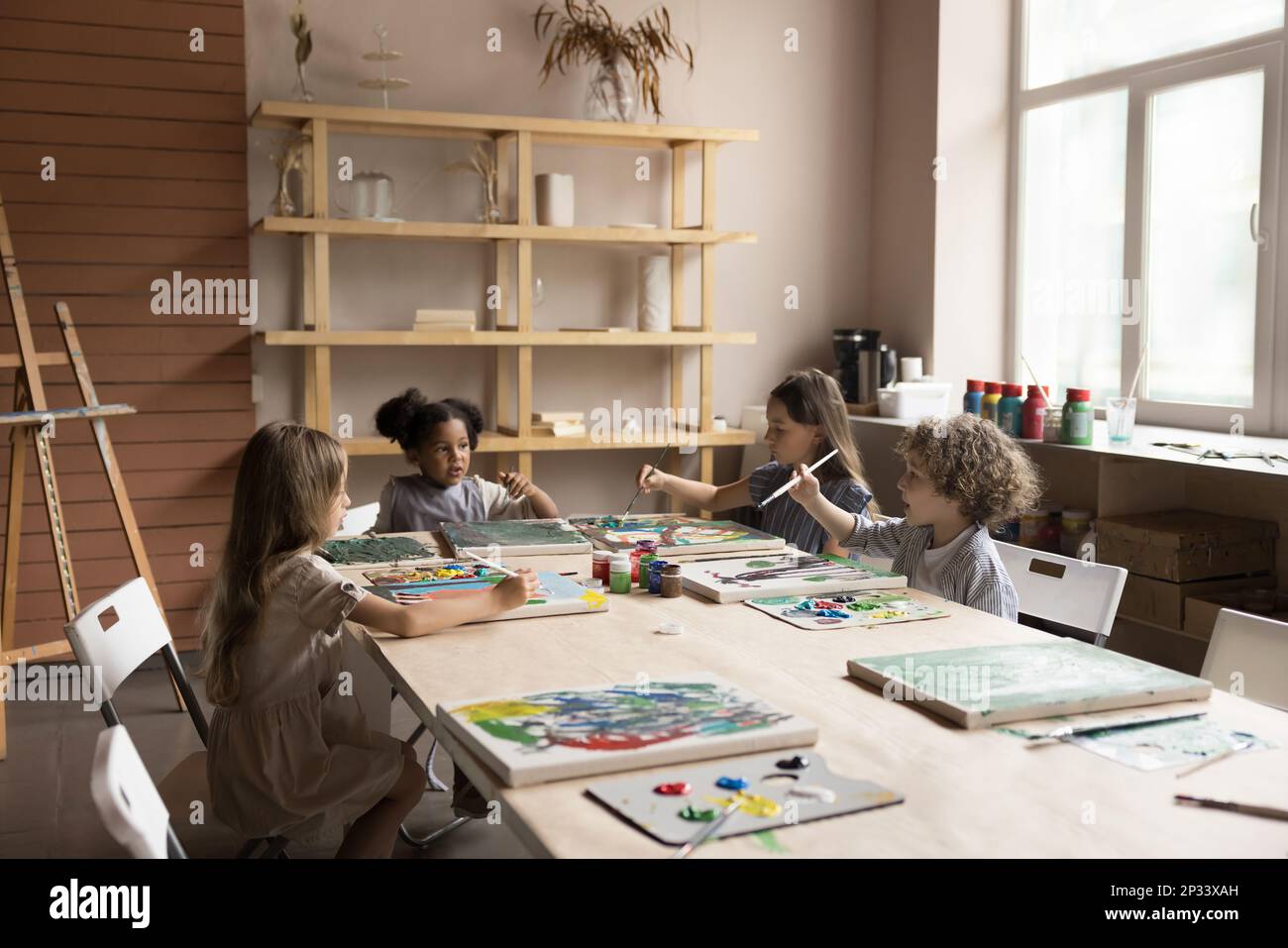 Class of diverse little pupil kids drawing colorful pictures Stock ...