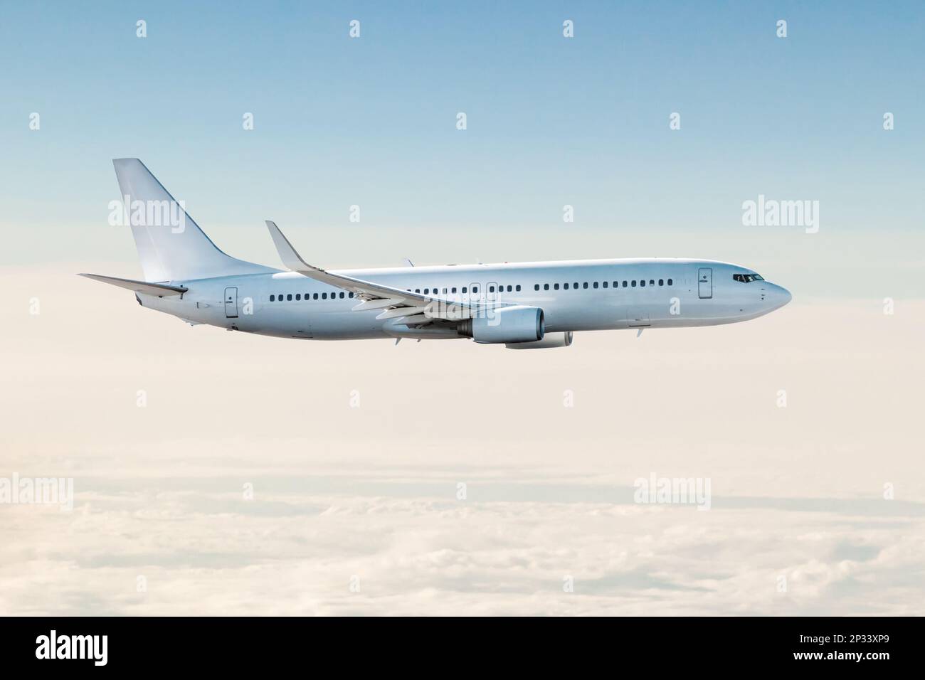 Plane flies high altitude above hi-res stock photography and images - Alamy