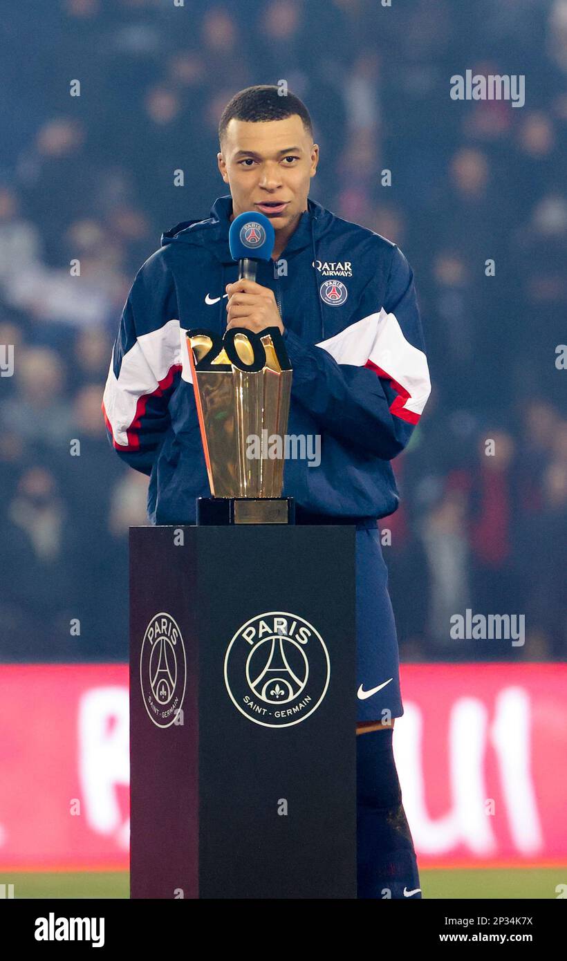 Kylian Mbappe of PSG receives a trophy celebrating his 201st goal for ...