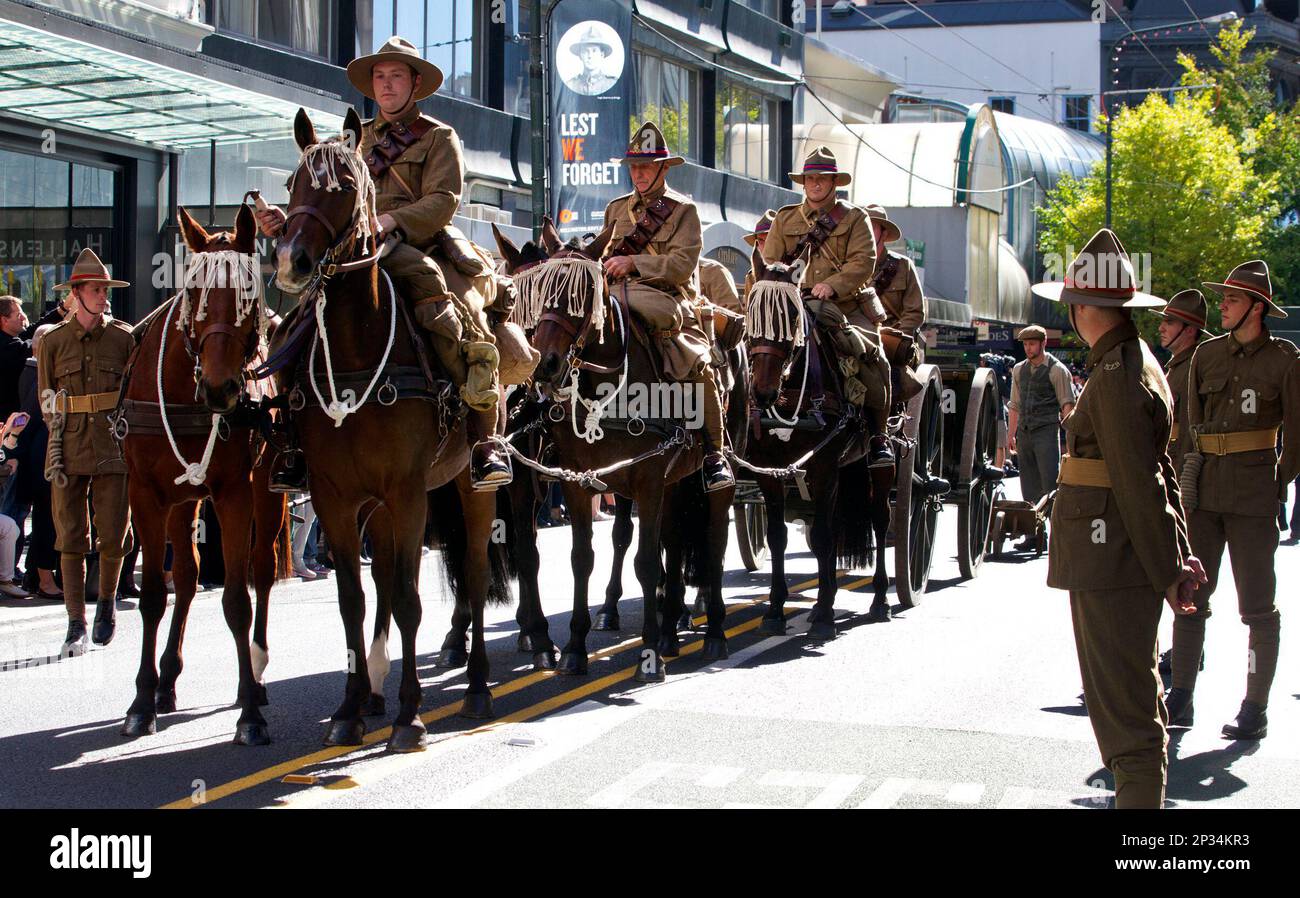 Mounted soldiers tow a gun carriage along Lambton Quay during during a ...