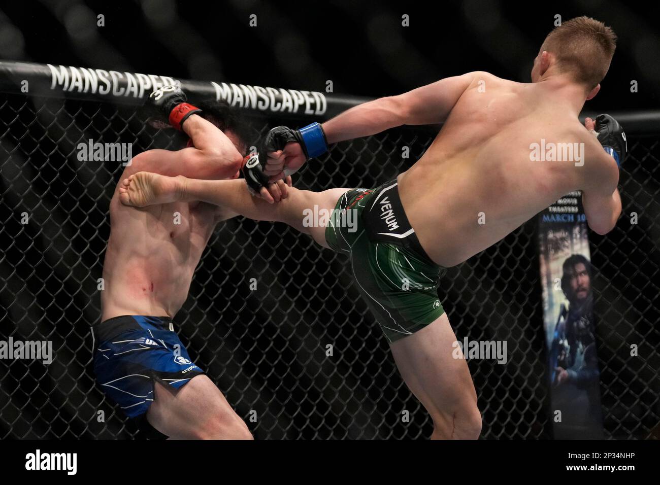 LAS VEGAS, NV - MARCH 4: (R-L) Cameron Saaiman kicks Mana Martinez in ...