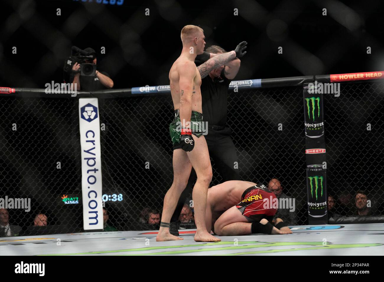 LAS VEGAS, NV - MARCH 4: (L-R) Ian Garry celebrates his victory over ...