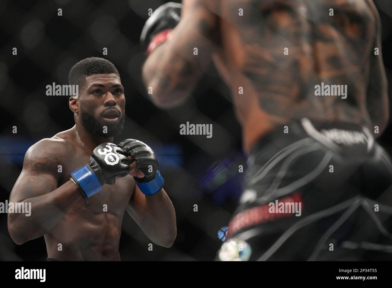 LAS VEGAS, NV - MARCH 4: (L-R) Trevin Jones battles Cody Garbrandt in ...