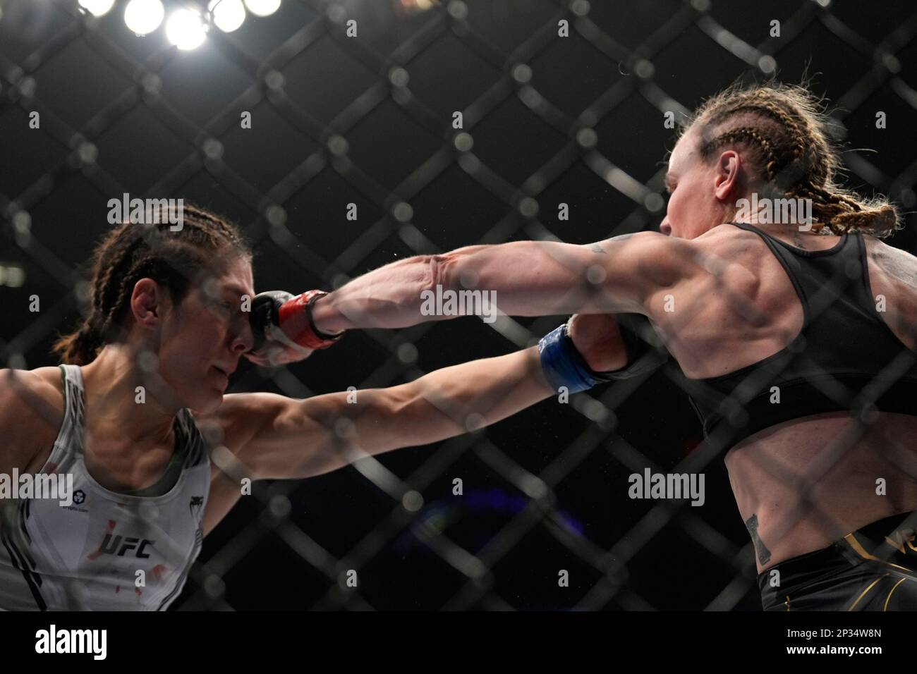 LAS VEGAS, NV - MARCH 4: (R-L) Valentina Shevchenko punches Alexa ...