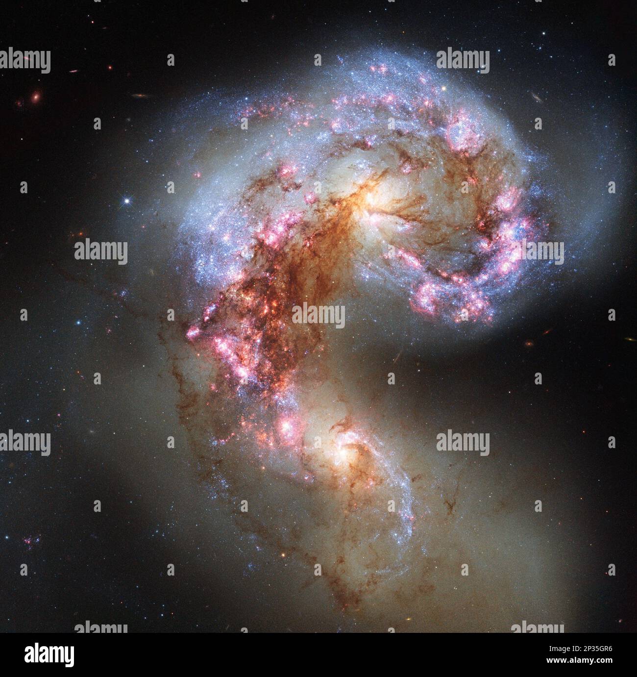 This image made by the NASA/ESA Hubble Space Telescope shows NGC 4038 and NGC 4039, known as the ...