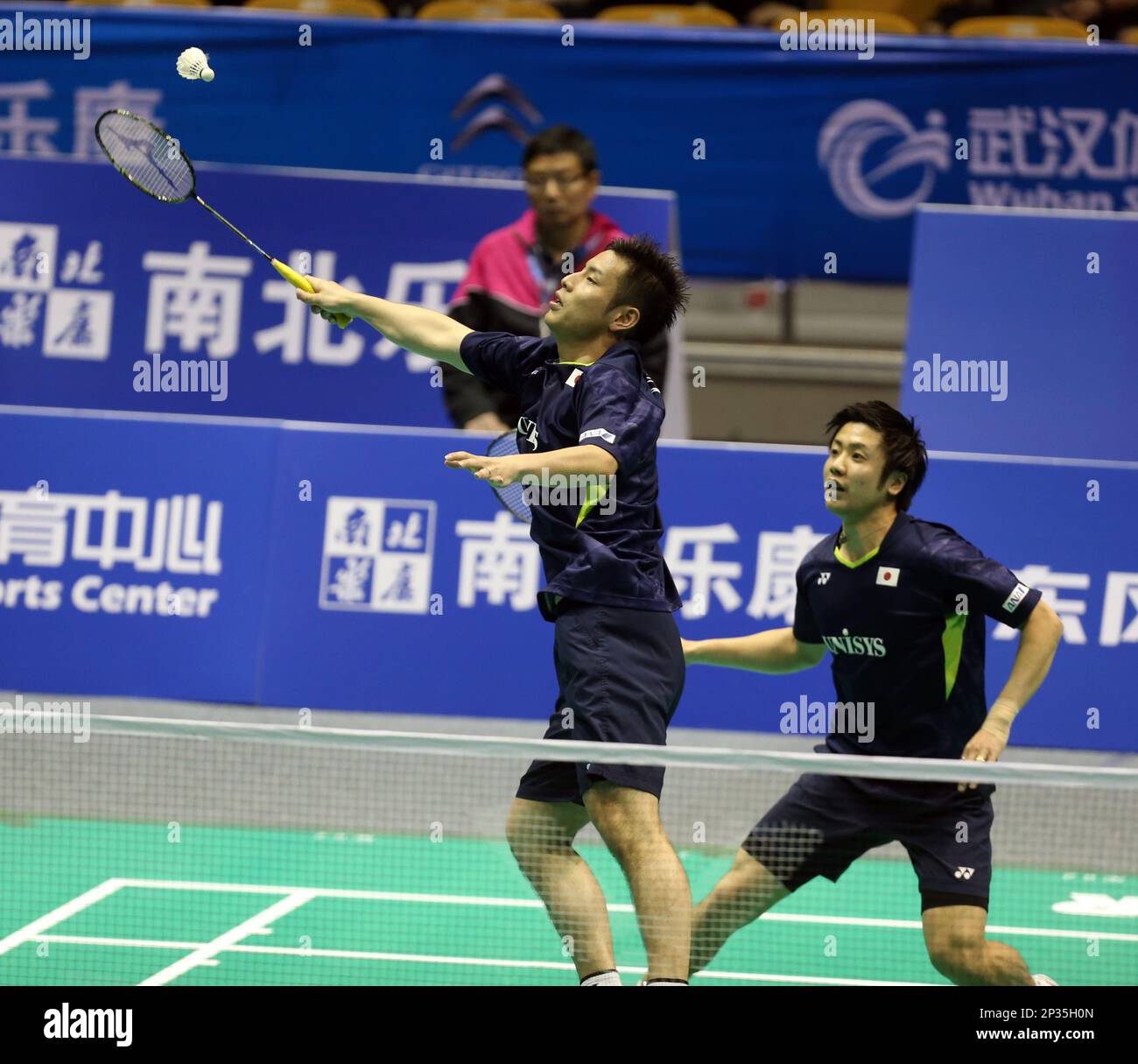 Kenichi Hayakawa, left, and Hiroyuki Endo of Japan compete against ...