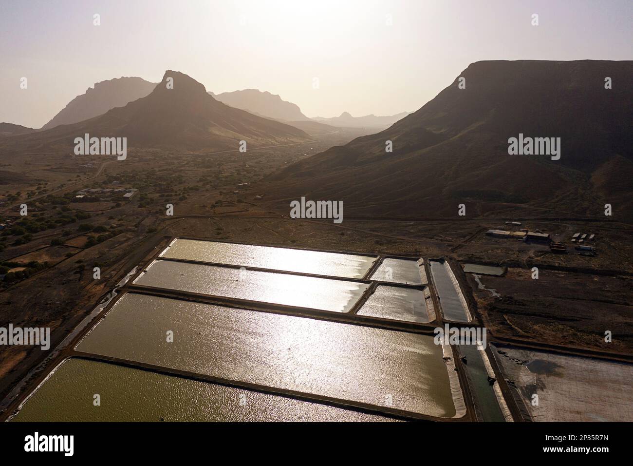 Aerial view of the pools of the shrimp farm near Calhau village on Sao ...