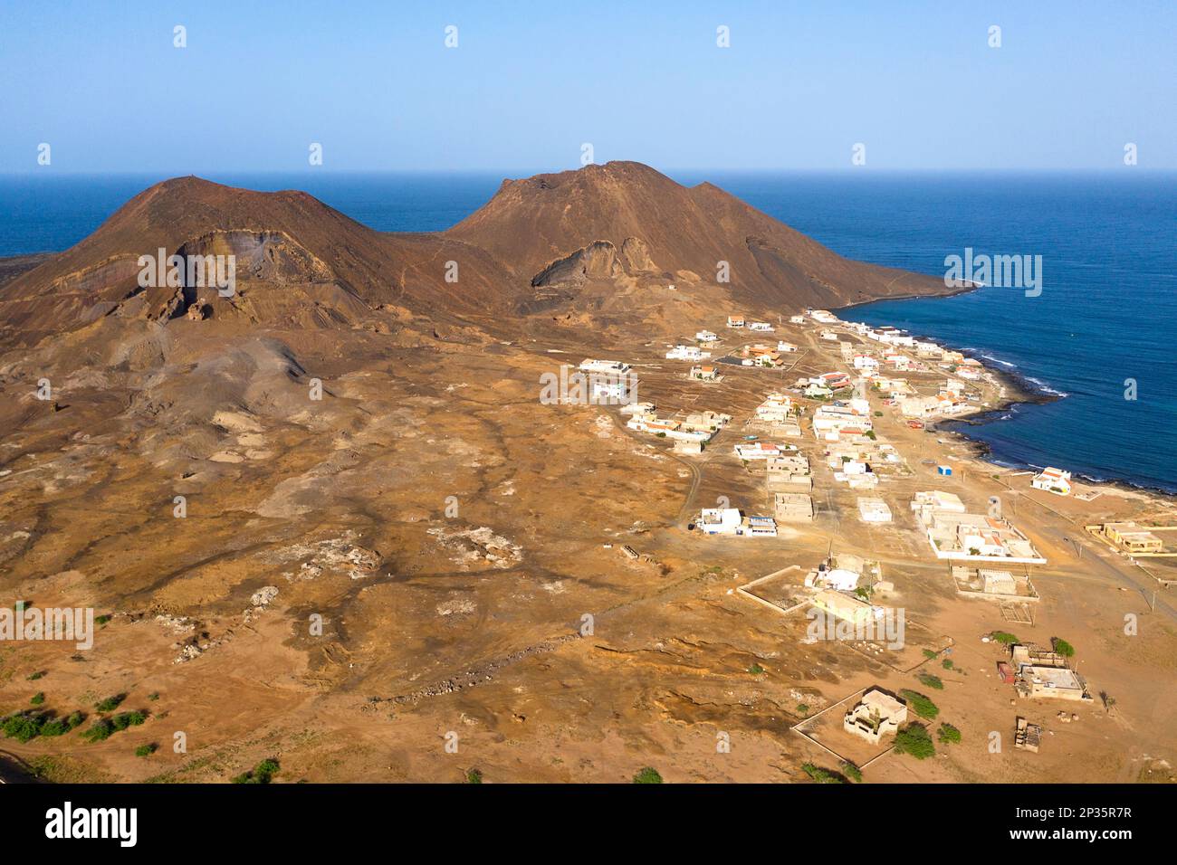 Aerial view of a Calhau village and extinct volcanoes on the seashore ...