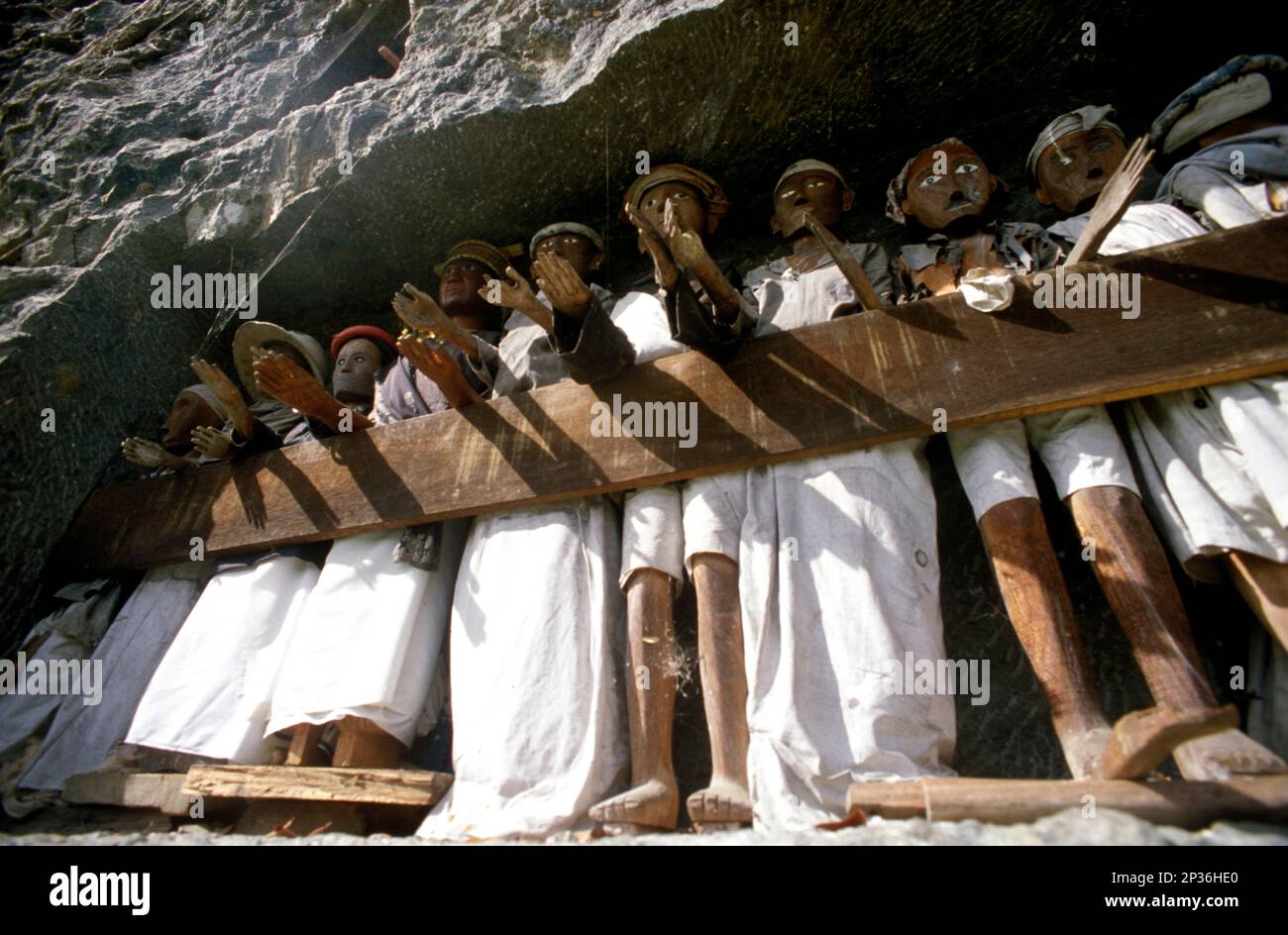 Tau-Tau, Effiges of the Dead in Tana Toraja, rock tombs of the noble ...
