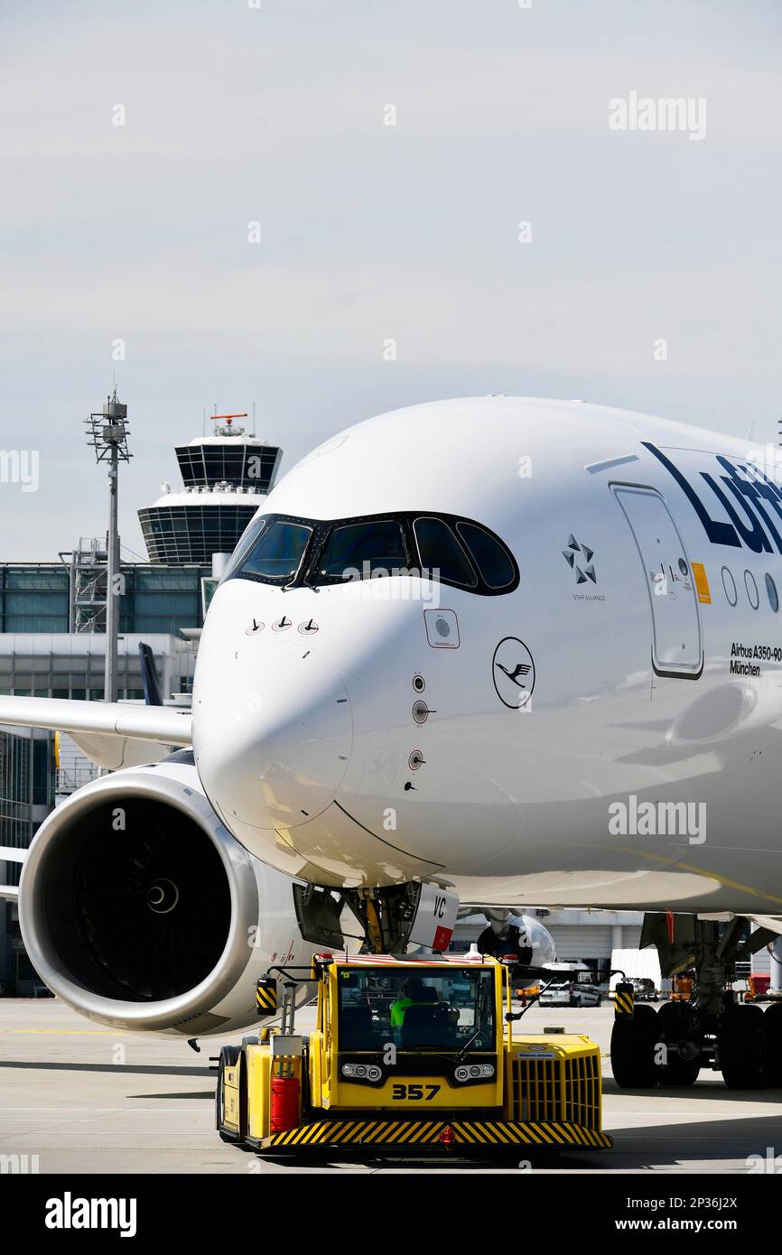Lufthansa Airbus A350-900 towing with push-back truck in front of ...