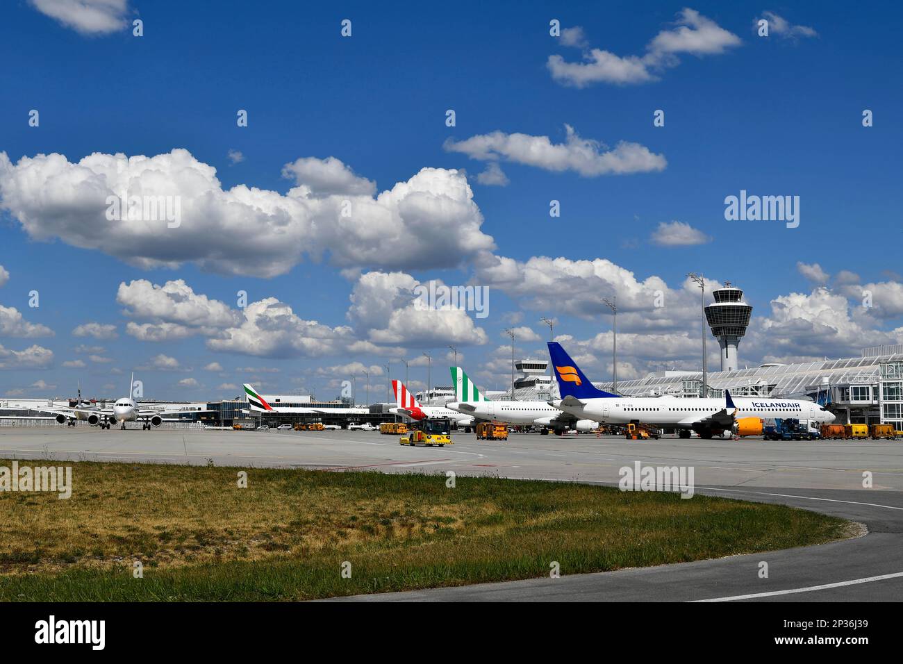 Aircraft parking on position at Terminal 1 with tower, ICELANDAIR ...