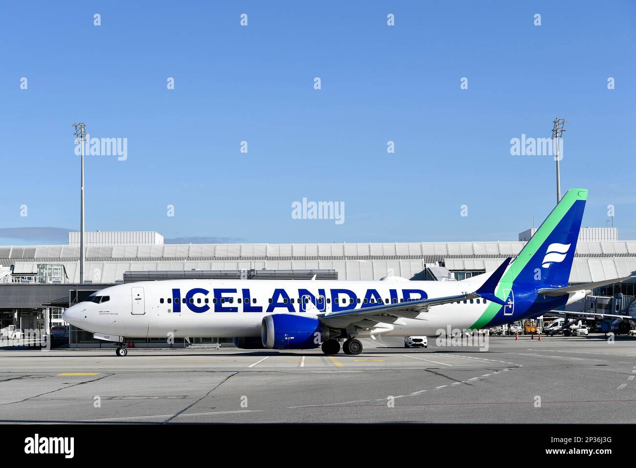 Iceland Air aircraft Boeing B737 MAX taxiing with Terminal 1, Munich ...