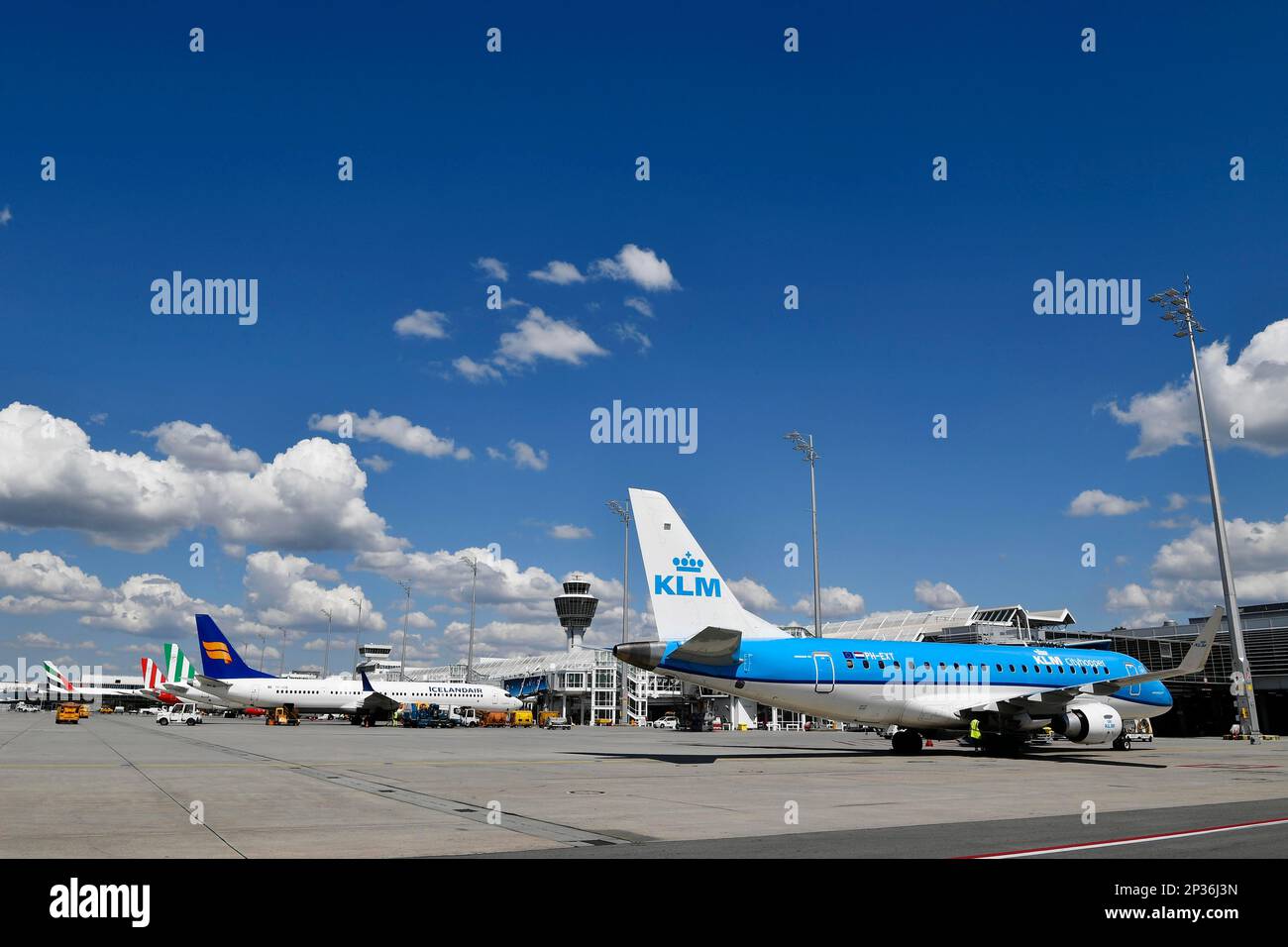 Aircraft parking on position at Terminal 1 with tower, KLM, ICELANDAIR ...