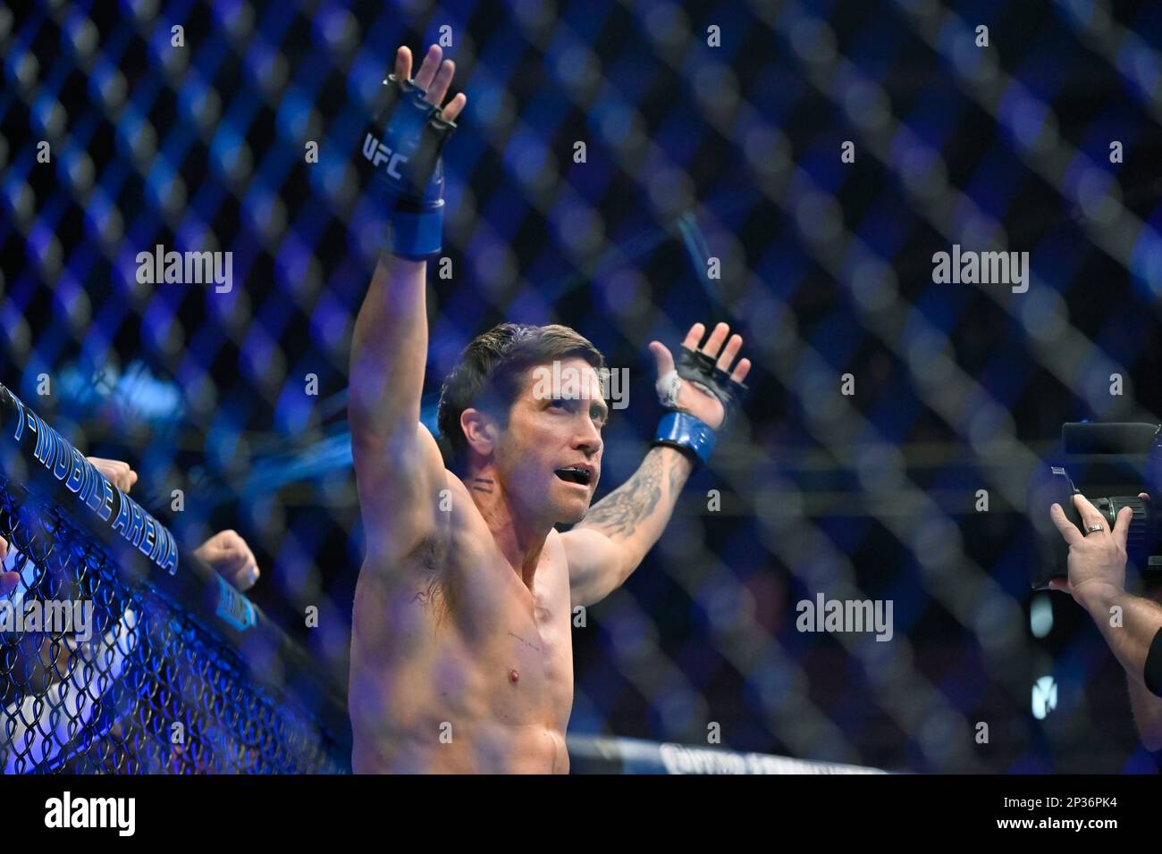 Actor Jake Gyllenhaal looks on while filming a scene for an upcoming ...