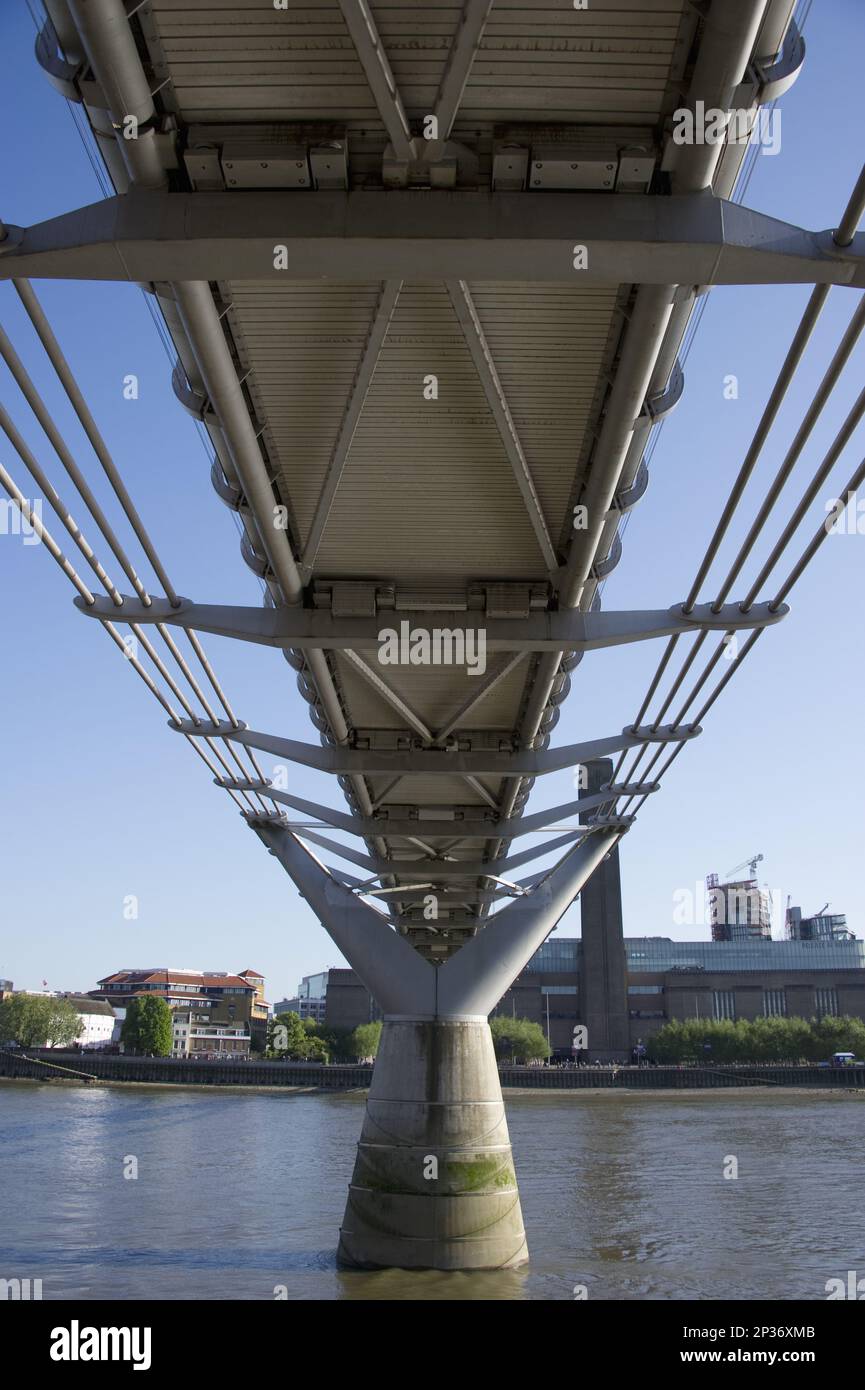 Under the steel suspension bridge over the river, Millennium Bridge ...