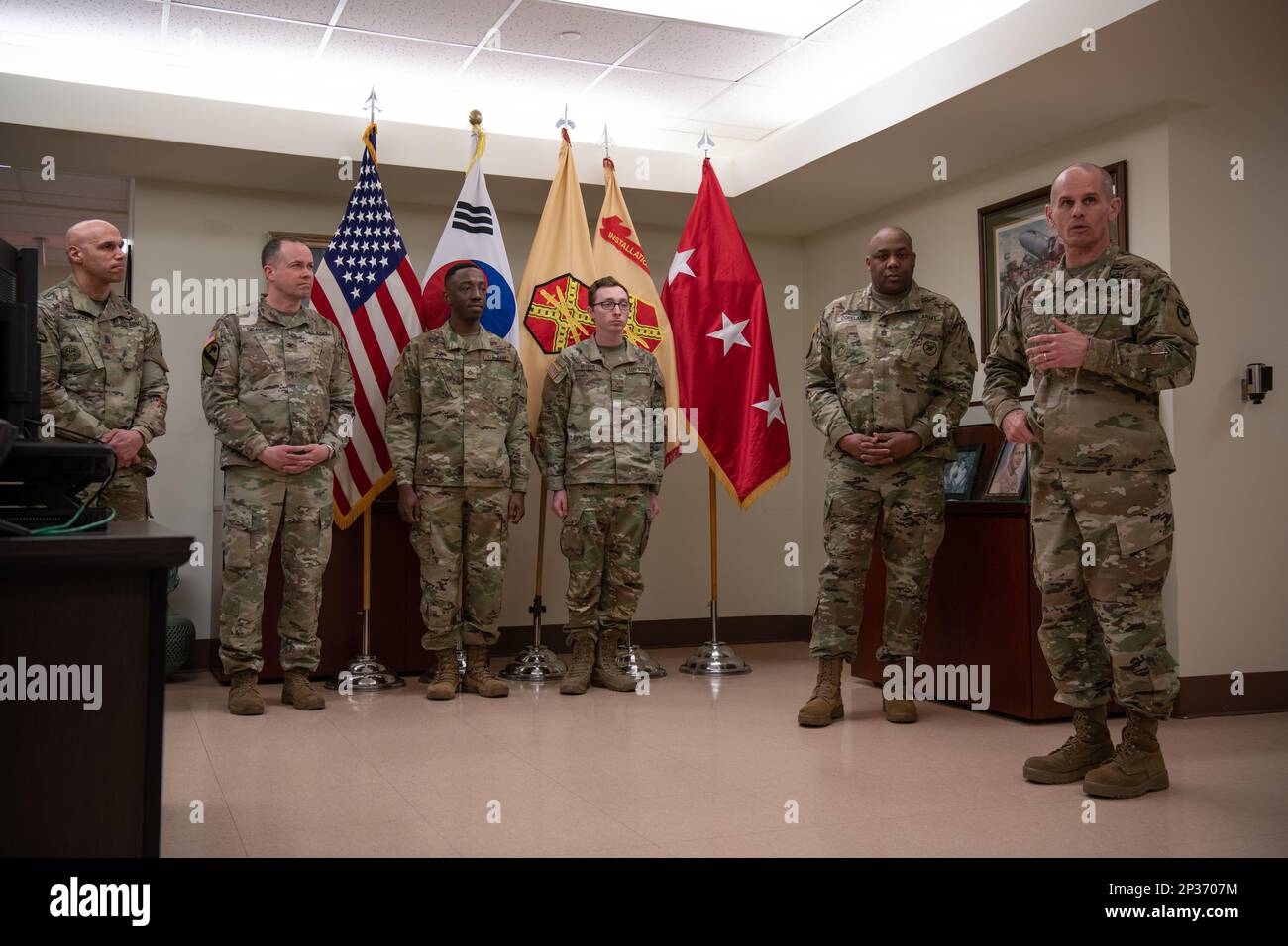 U.S. Army Lt. Gen. Omar Jones, the IMCOM commanding general, far right ...