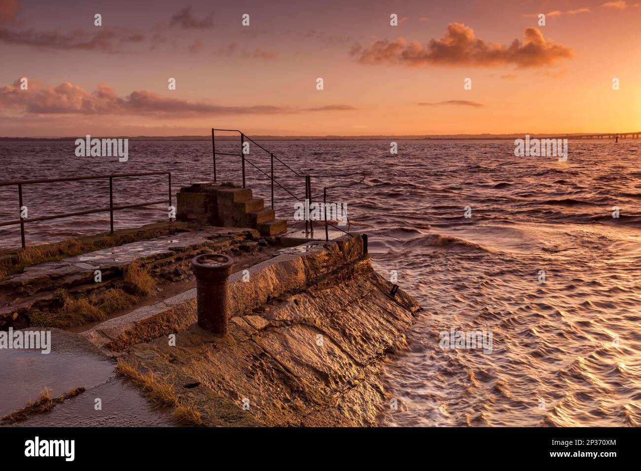 View of the jetty at sunrise, Sudbrook Jetty, River Severn, Severn Estuary, Monmouthshire, Wales ...