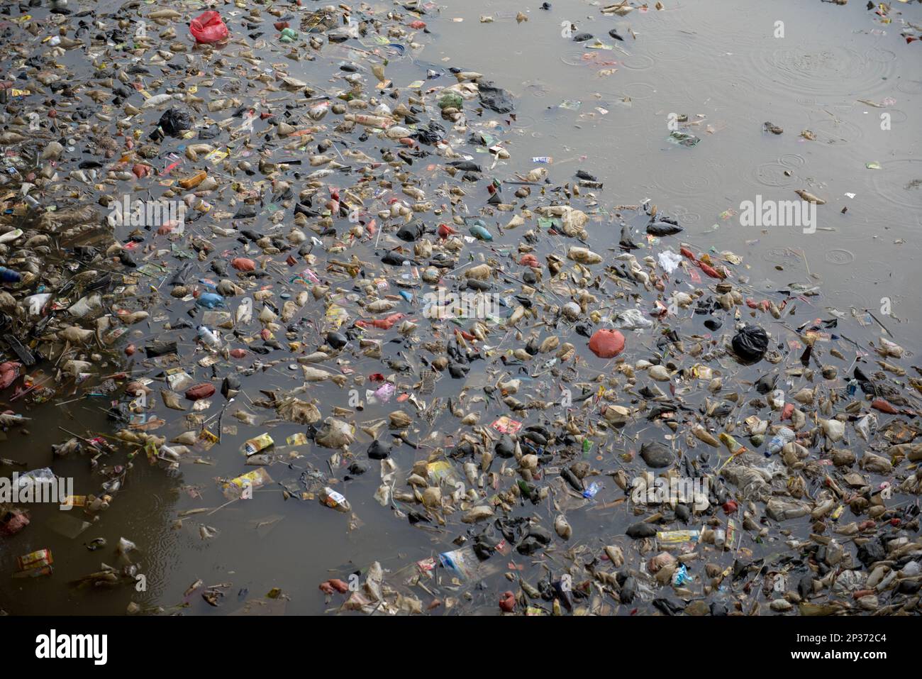 Rubbish floating on river in city, Manggarai District, Jakarta, Java ...
