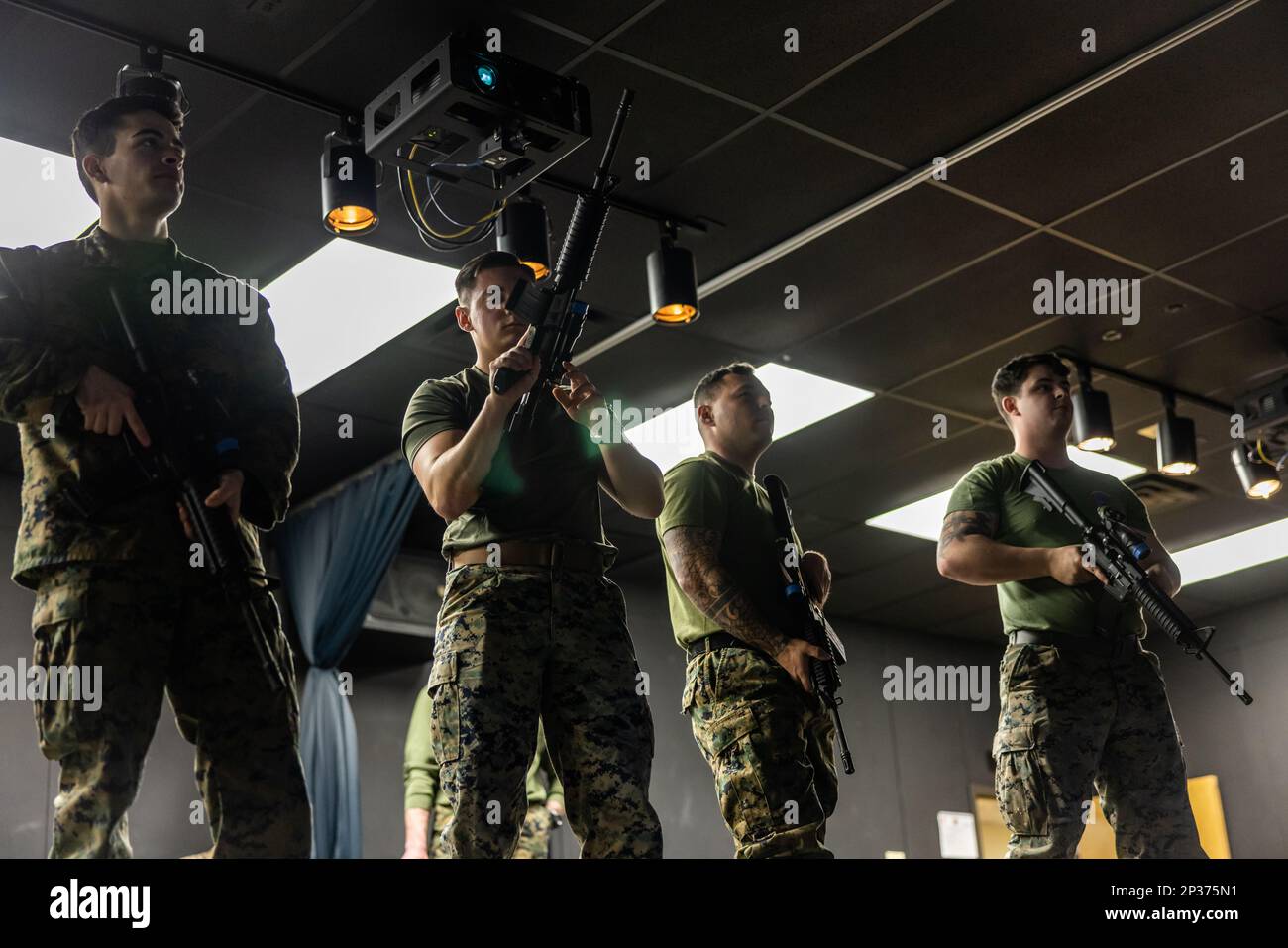 U.S. Marines with Security Battalion shoot an M4 rifle at the Indoor ...