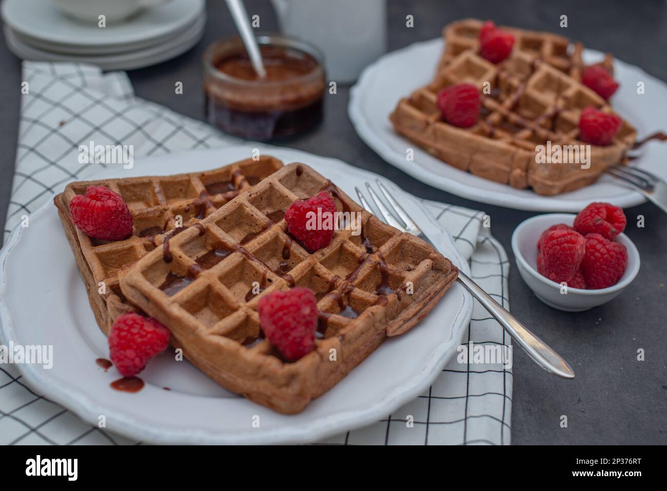 sweet home made chocolate waffles with raspberries Stock Photo - Alamy