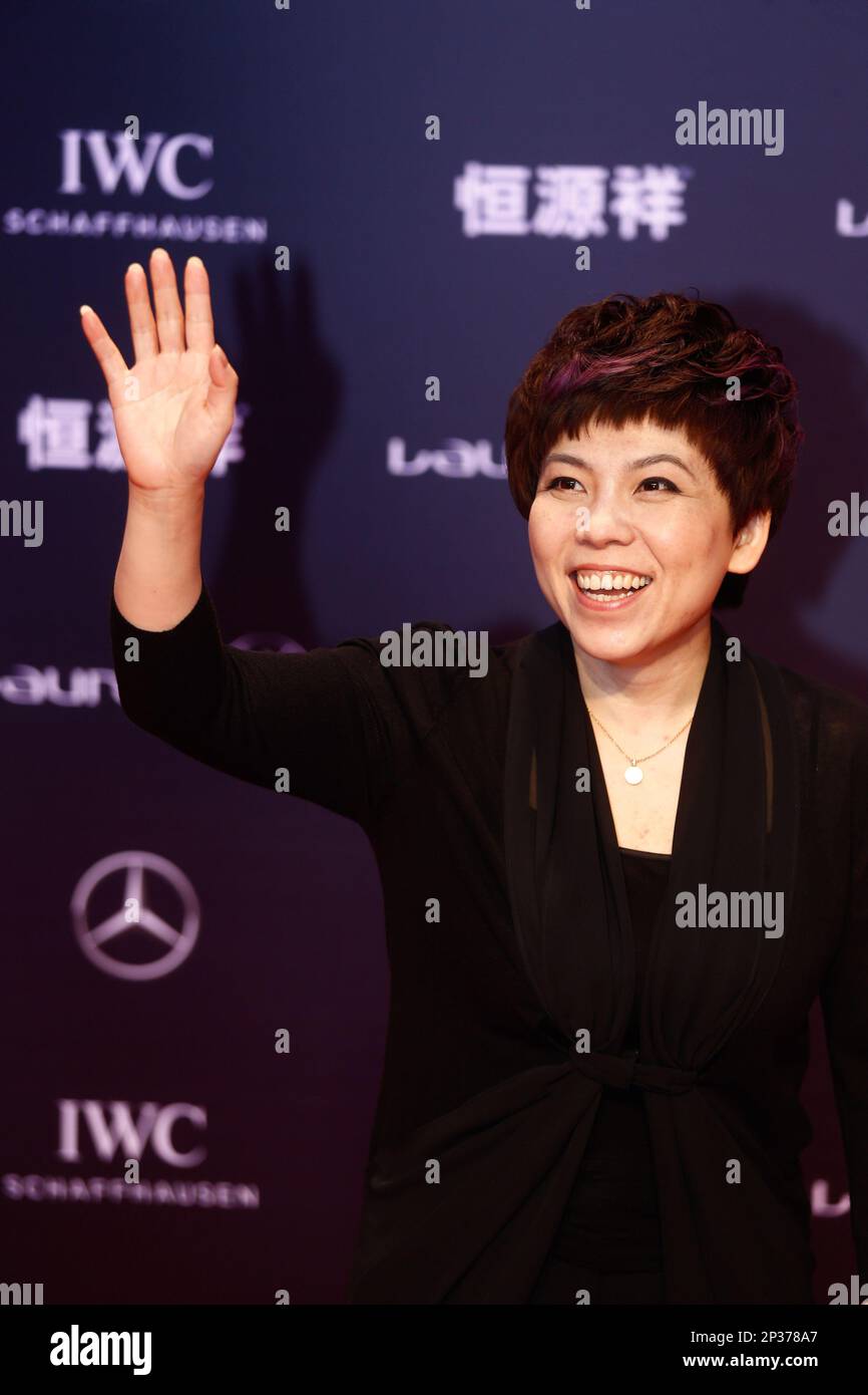 Former Chinese table tennis world champion Deng Yaping poses on the red ...