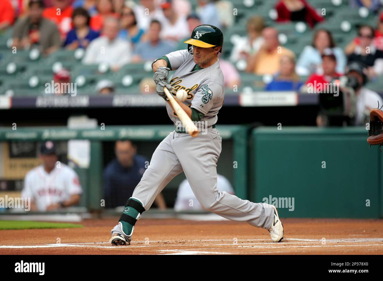 APR 15 2015: Oakland Athletics outfielder Sam Fuld #23 swings and hits ...