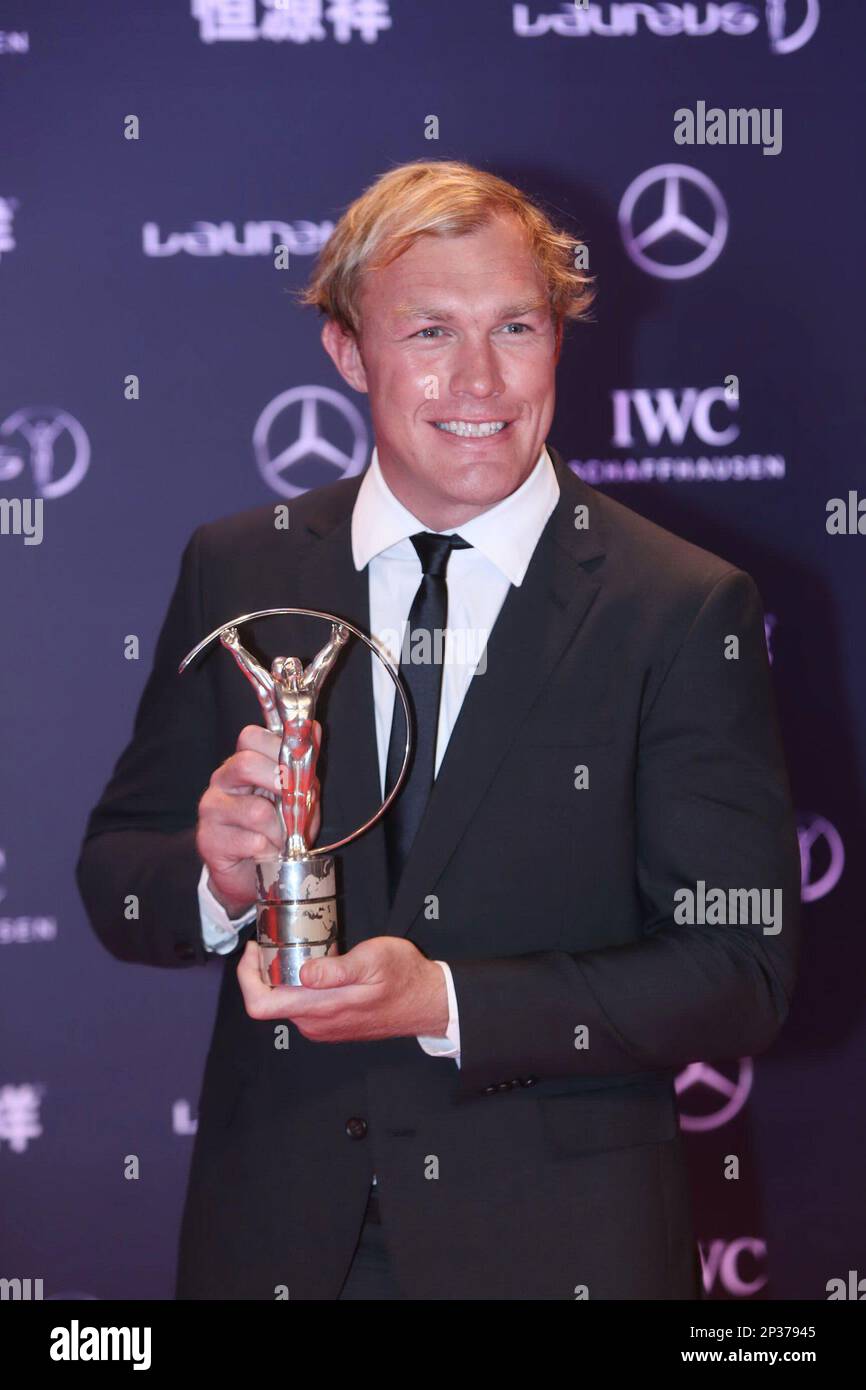 South African rugby player Schalk Burger poses with his trophy of ...