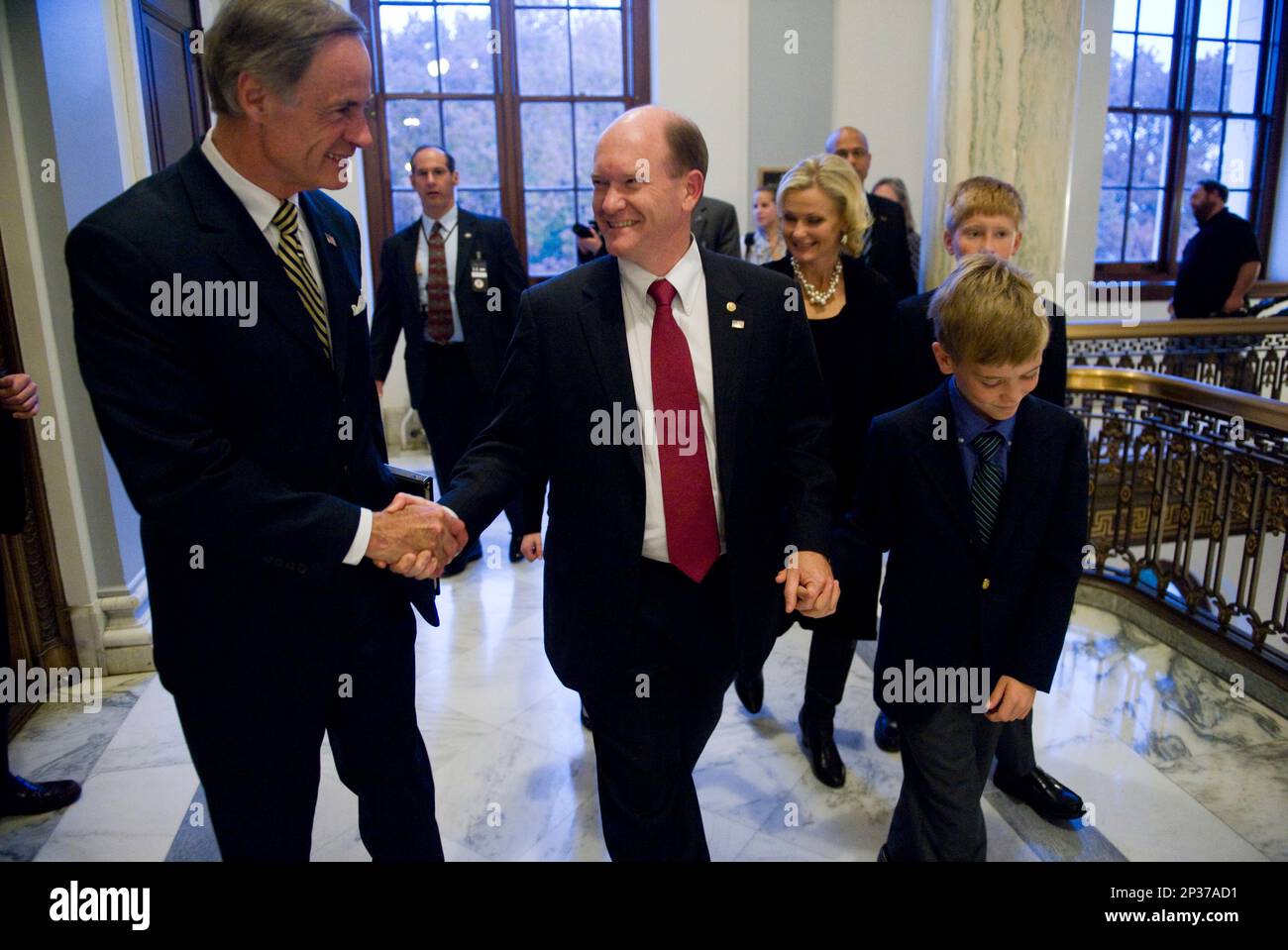 UNITED STATES - NOVEMBER 15: Sen. Tom Carper, D-Del., left, greets ...