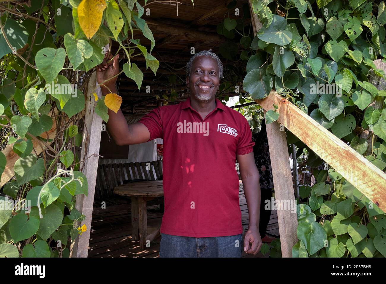 Owner James Kateeba stands on his floating restaurant and bar on Lake ...