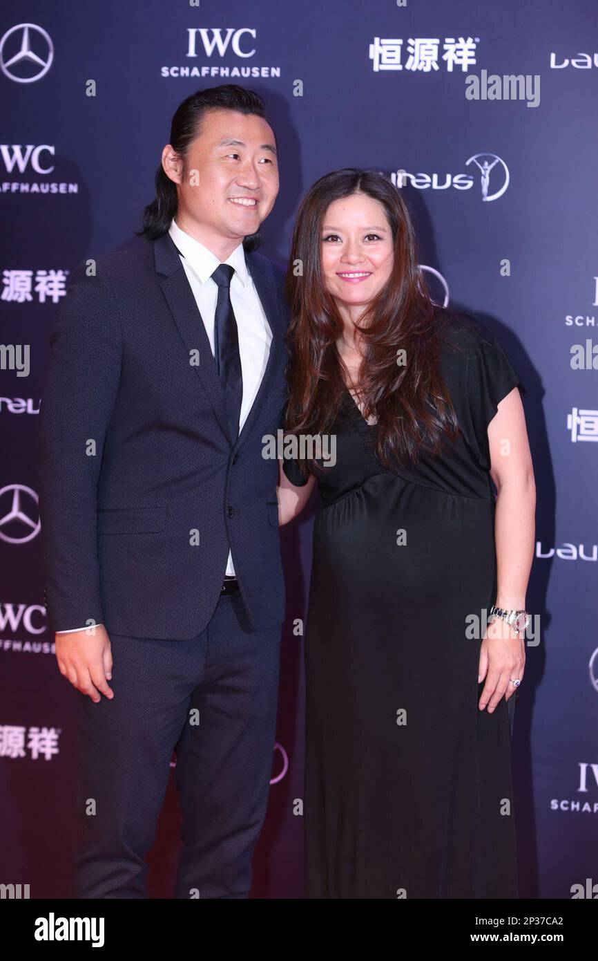 Retired Chinese tennis star Li Na, right, and her husband Jiang Shan ...