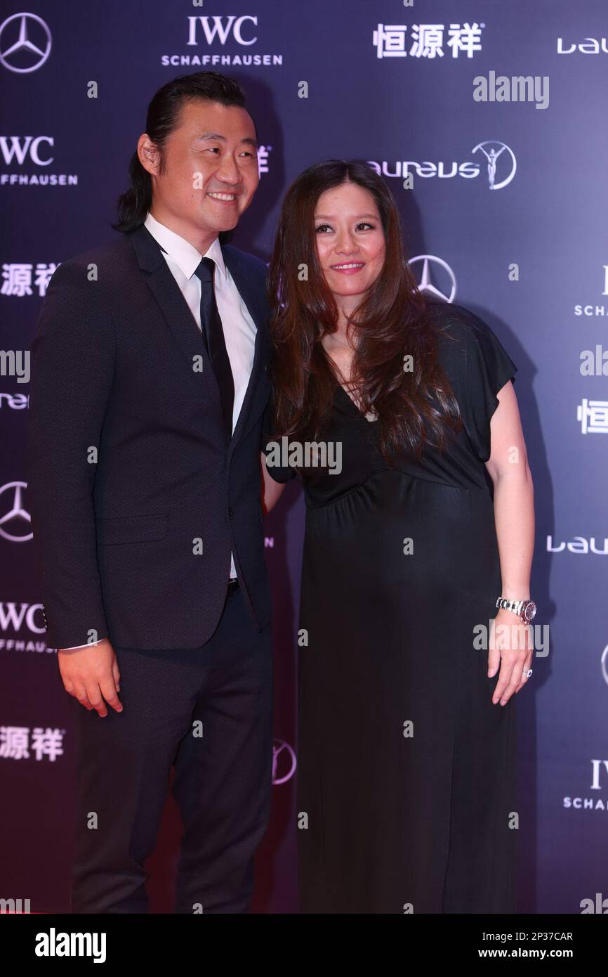 Retired Chinese tennis star Li Na, right, and her husband Jiang Shan ...