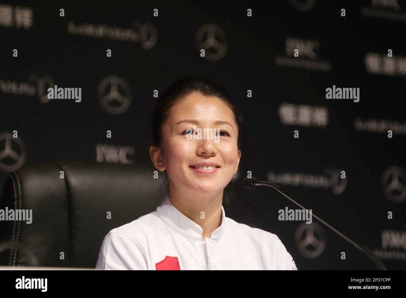 Former Chinese Olympic speed skating champion Yang Yang smiles during a ...