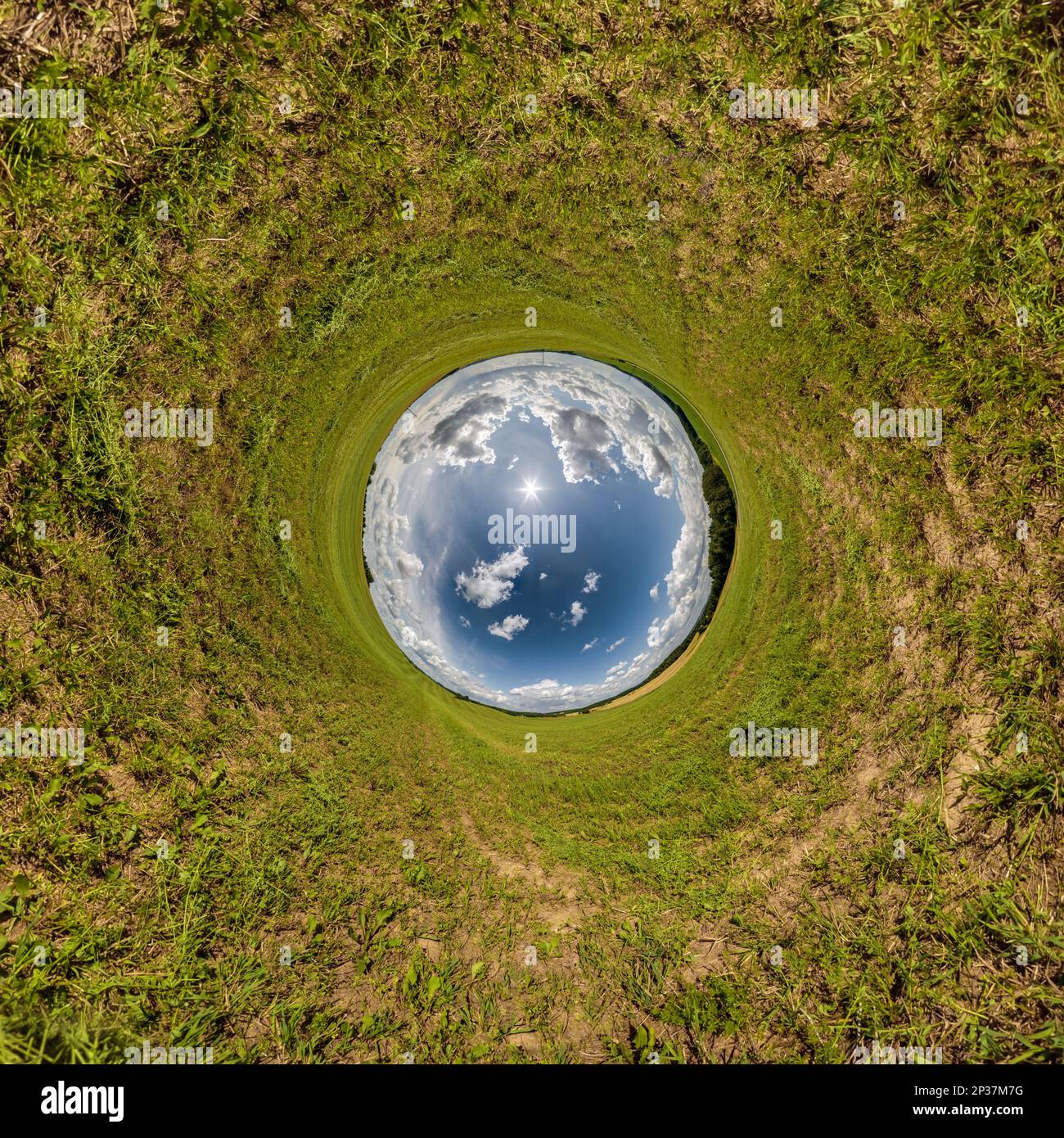 blue hole sphere little planet inside green grass round frame ...
