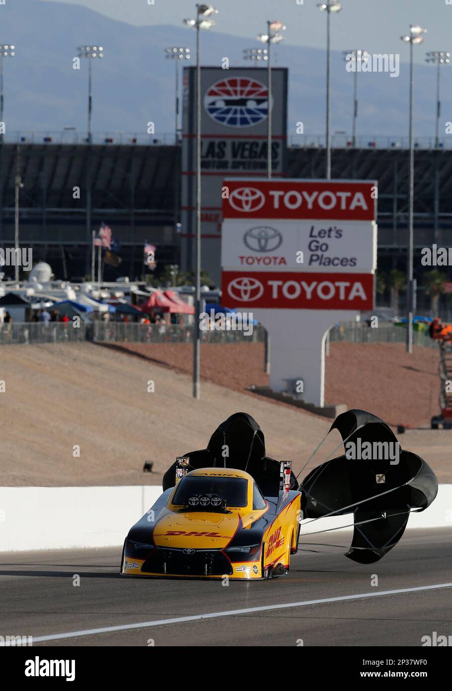 11 April 2015: Del Worsham (750 FC) Toyota Camry NHRA Funny Car deploys ...