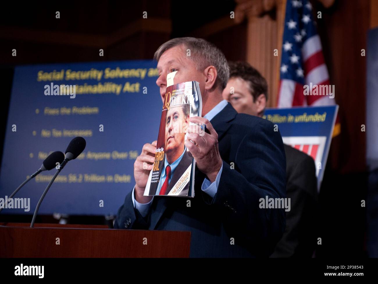UNITED STATES - April 13: Sen. Lindsey Graham, R-S.C.; holds up a copy ...