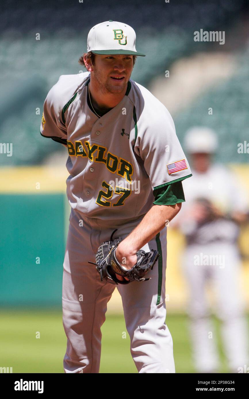 Baylor Bears pitcher Drew Tolson (27) looks to his catcher for the sign ...