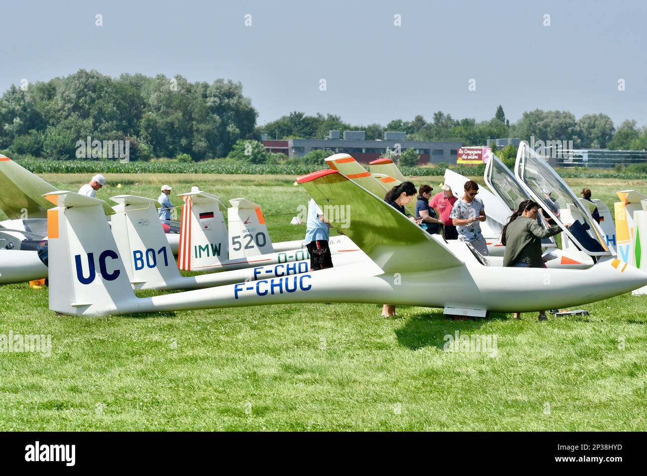 Gliders are waiting on the airfield before a competition. At the ...
