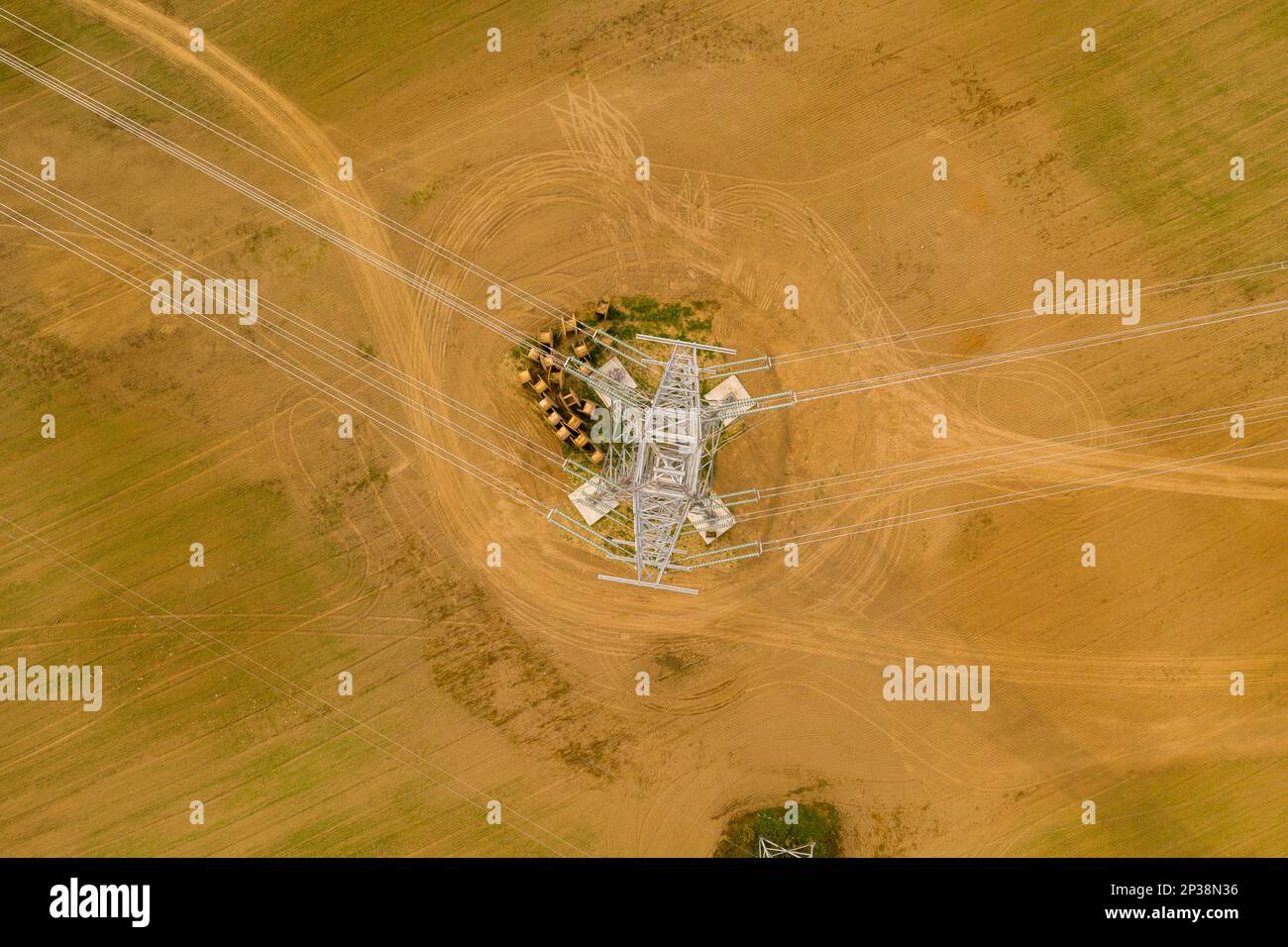 Drone top down view of high voltage electrical line and steel ...