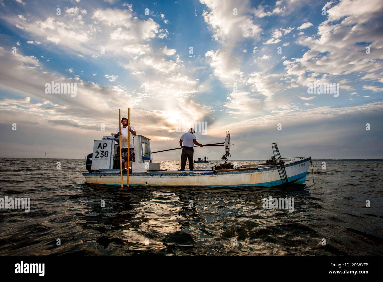 In this Thursday, April 2, 2015 photo, Corey Lashley, left, and his ...