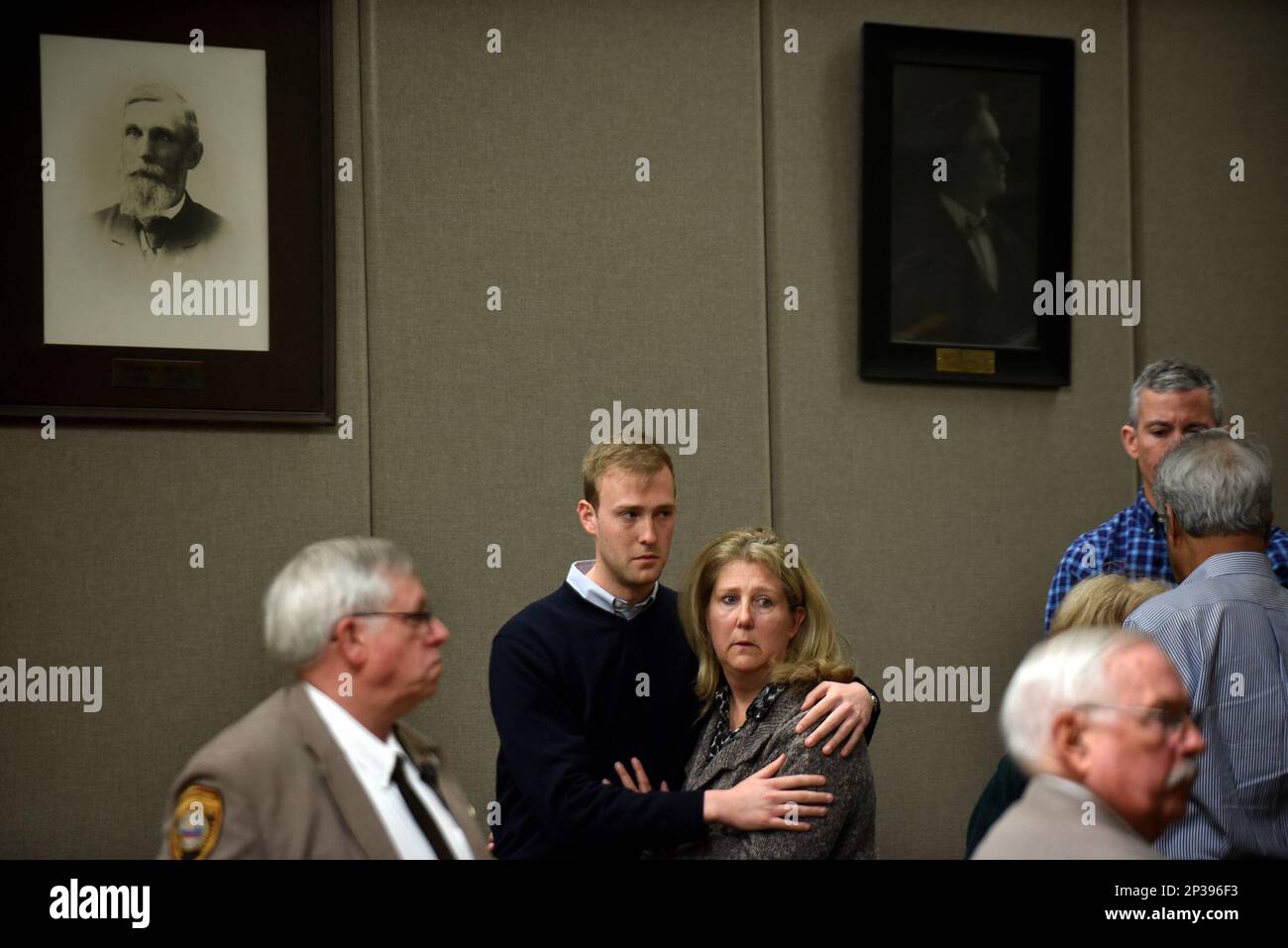 Deborah Dellinger hugs her son Douglas after the sentencing of her ...