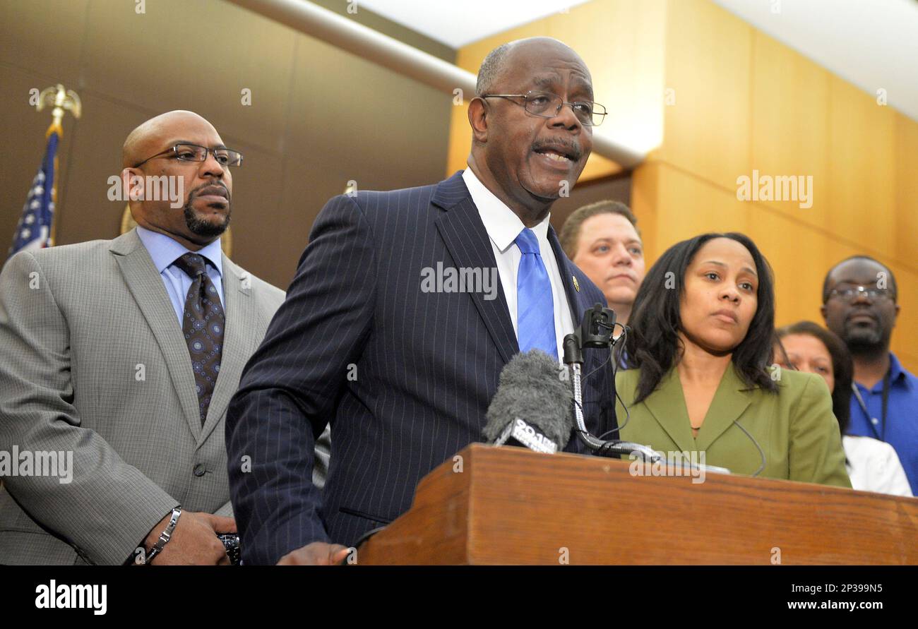 Fulton County District Attorney Paul Howard, center, holds a press ...