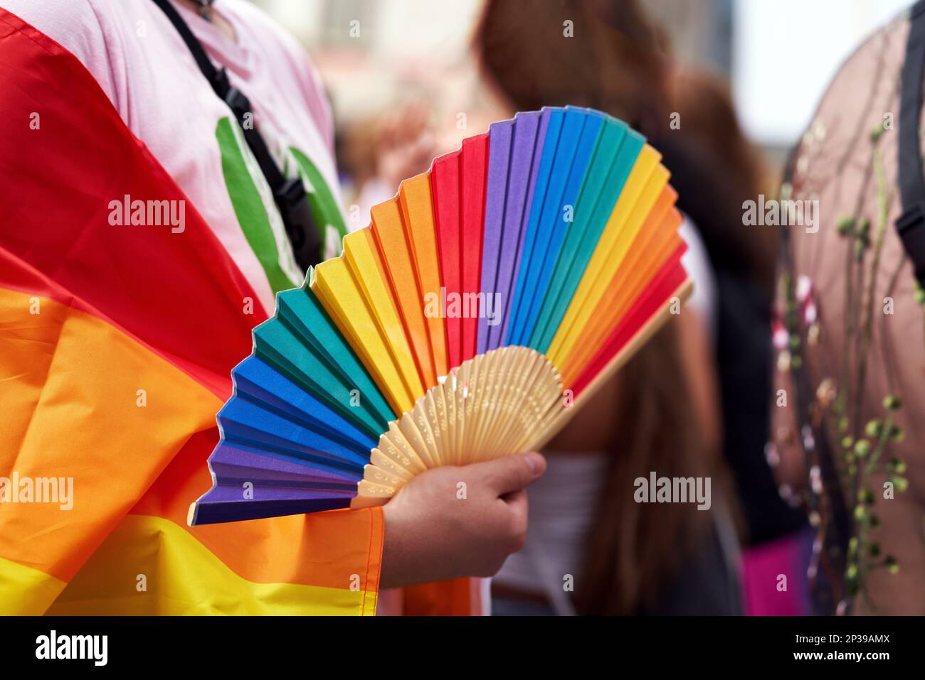 Colorful rainbow fan during gay pride Stock Photo - Alamy