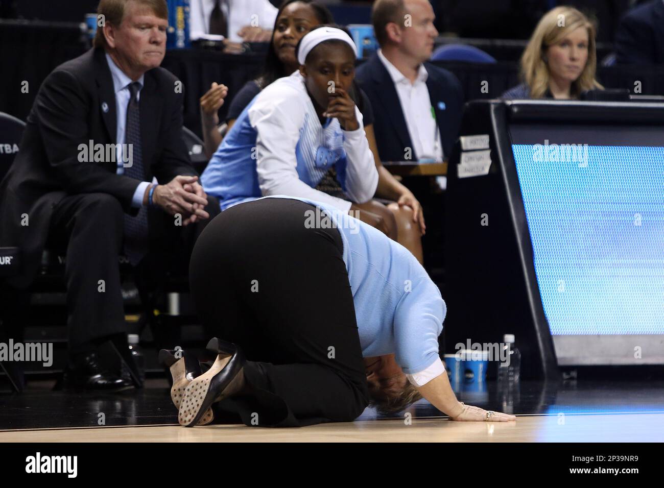27 March 2015: UNC head coach Sylvia Hatchell collapses to the ground ...