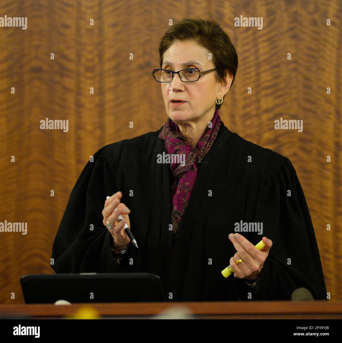 Superior Court Judge E. Susan Garsh enters the courtroom during the ...